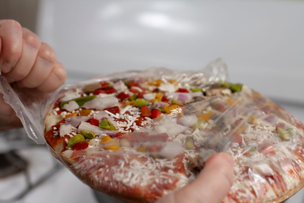 How to Heat Up Frozen Pizza: Quick and Easy Tips - Pizzaware